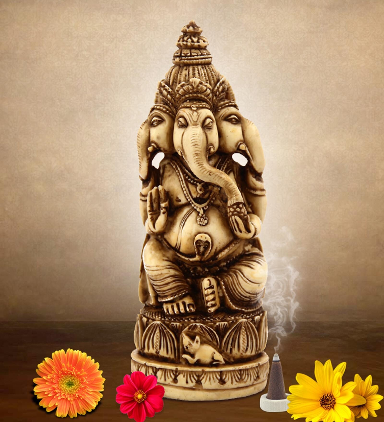 Buy Off White Resin Three Faced Round Ganesha Carved In Antique Finish ...